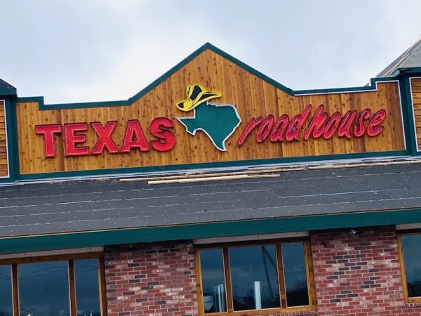 Neon-style sign goes up at new Texas Roadhouse - The Burn