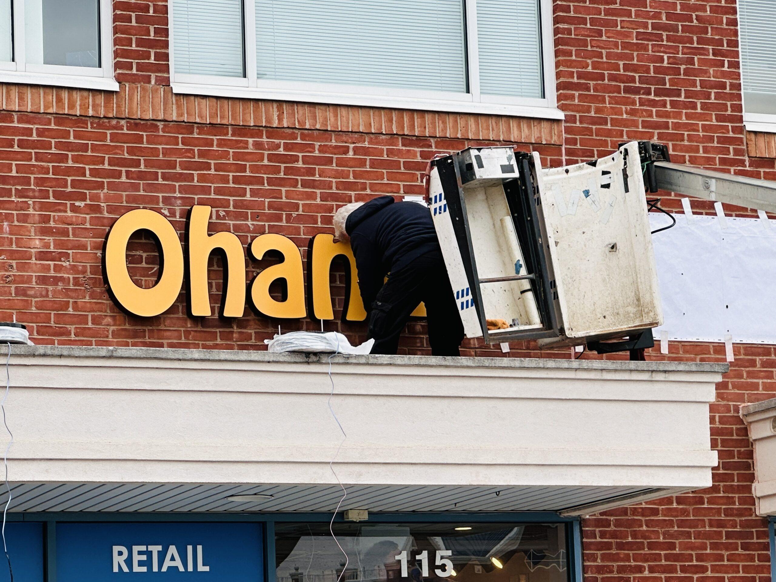 Sign installed at new poke restaurant in Ashburn Village - The Burn